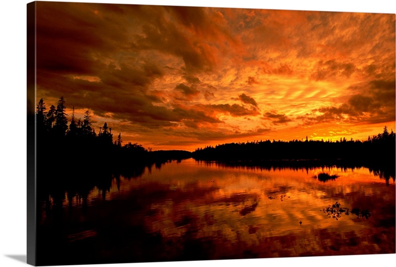 Orange sunset over a lake | Great Big Canvas