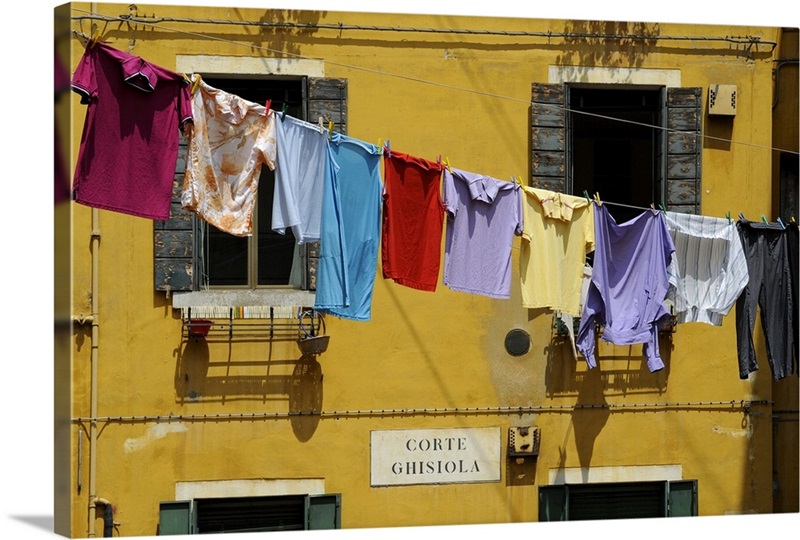 Clothes hanging on a washing line between houses, Venice, Veneto, Italy ...