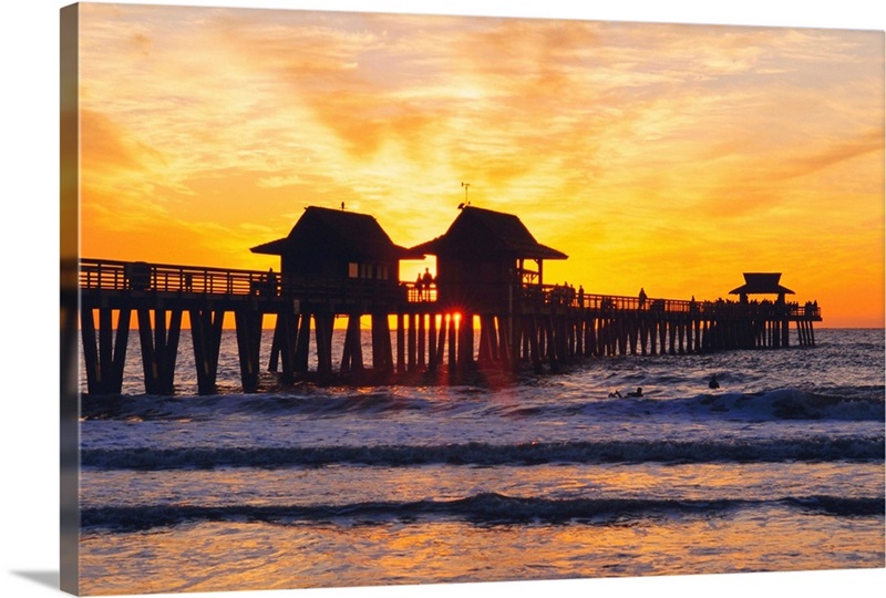 Naples, Florida, People gathered on the pier at sunset | Great Big Canvas
