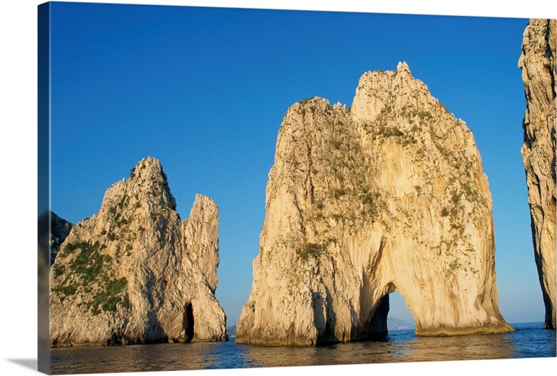 Rock arches known as the Faraglioni Stacks, Campania, Italy | Great Big ...