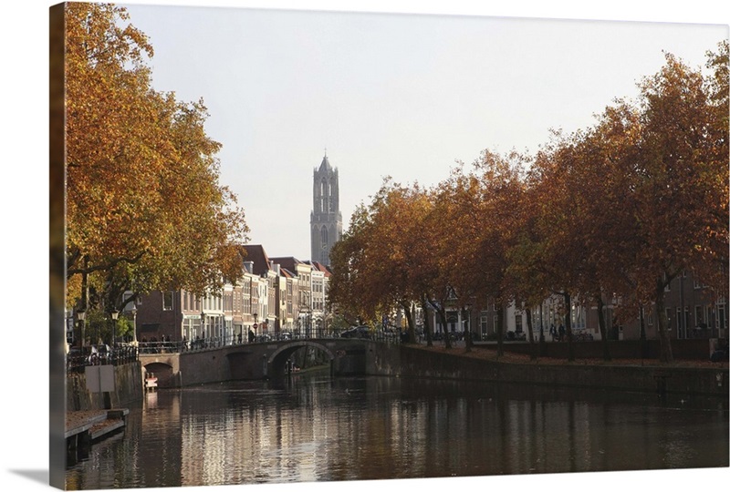 The Dom Tower and canal waterway on an autumn day, Utrecht, Netherlands ...