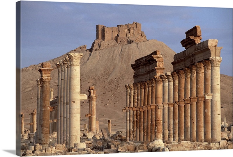 The Great Colonnade, with Arab castle on hill in background, Palmyra ...