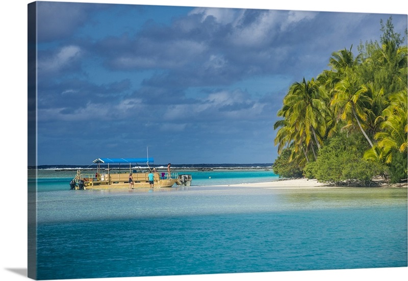 Traditional wood carved boat in the Aitutaki lagoon, Rarotonga and the ...