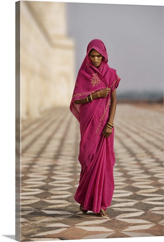 Indian woman in red dress walking by the Taj Mahal, Agra, India | Great ...