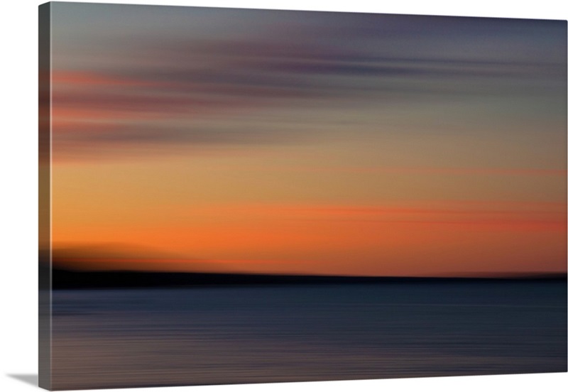 Moody beach scene at sunset | Great Big Canvas