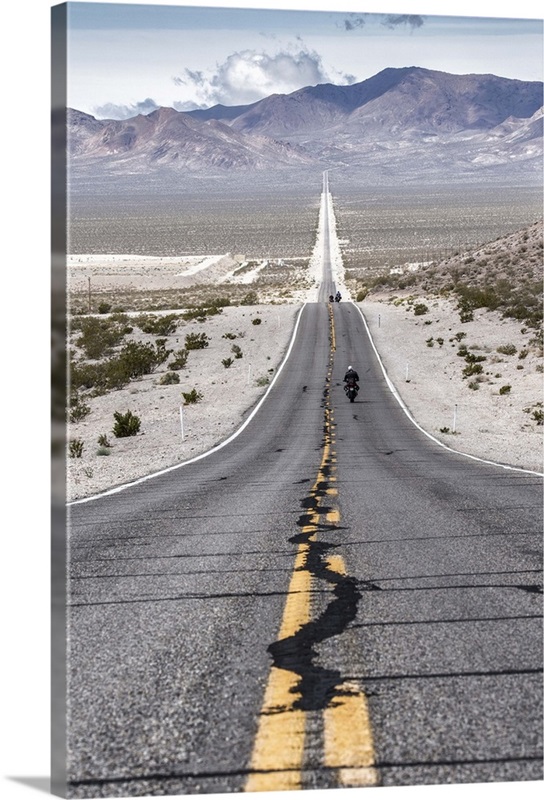 Motorcycles riding long road into Death Valley National Park | Great ...