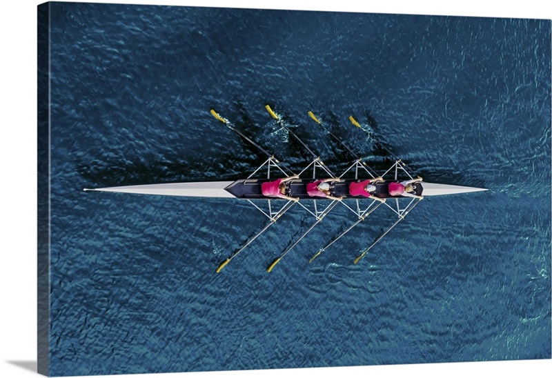 Top View Of Women's Rowing Team On Blue Water | Great Big Canvas