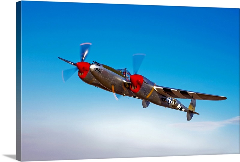 A Lockheed P 38 Lightning fighter aircraft in flight | Great Big Canvas