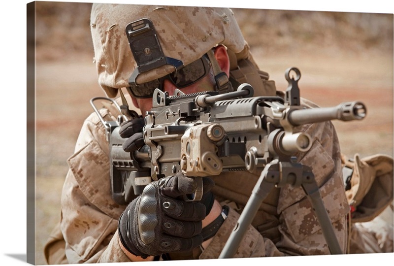 A squad automatic weapon gunner provides security | Great Big Canvas