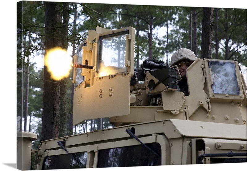 A US Marine Fires A M-240B Machine Gun Atop A Humvee | Great Big Canvas