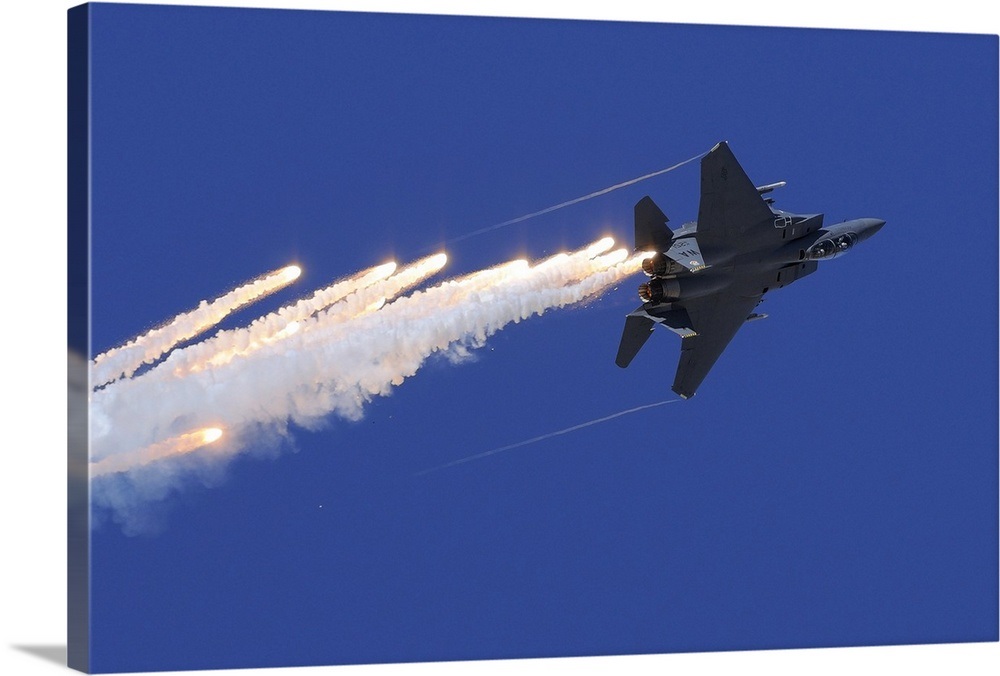 An F-15E Strike Eagle releases flares Wall Art, Canvas Prints, Framed ...