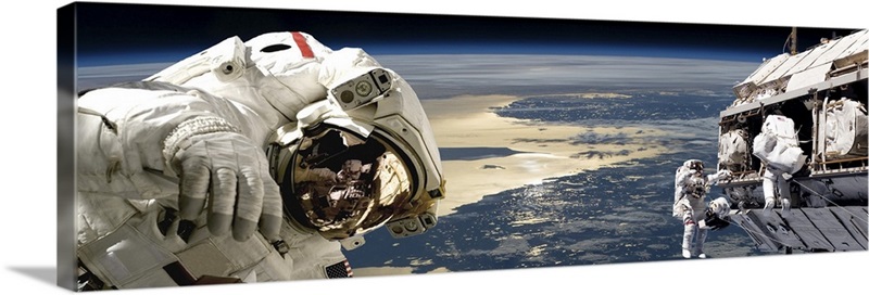 Astronauts working on space station while orbiting above the Baltric ...