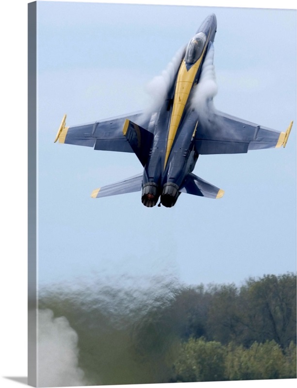 Lead solo pilot of the Blue Angels performs a high performance climb ...