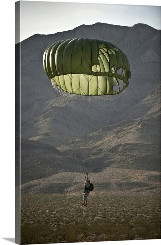 Soldier prepares to land after a static-line jump | Great Big Canvas