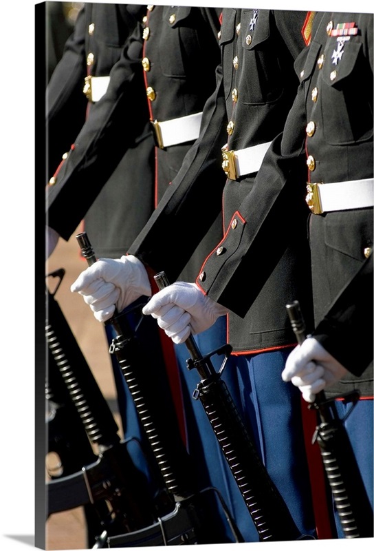 The Kaneohe Rifle team stands at parade rest with 556 mm M16A2 rifles ...