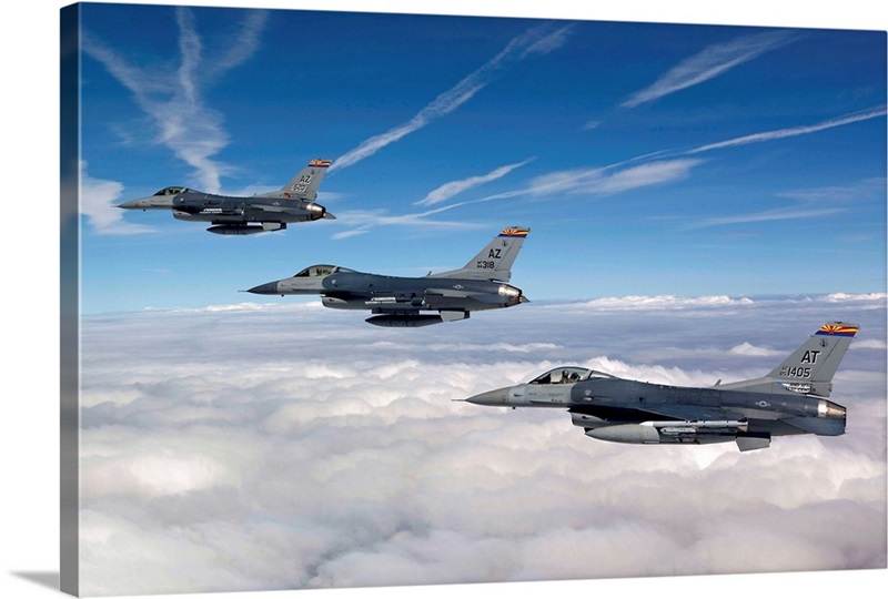 Three F-16s fly in formation during a training mission over Arizona ...