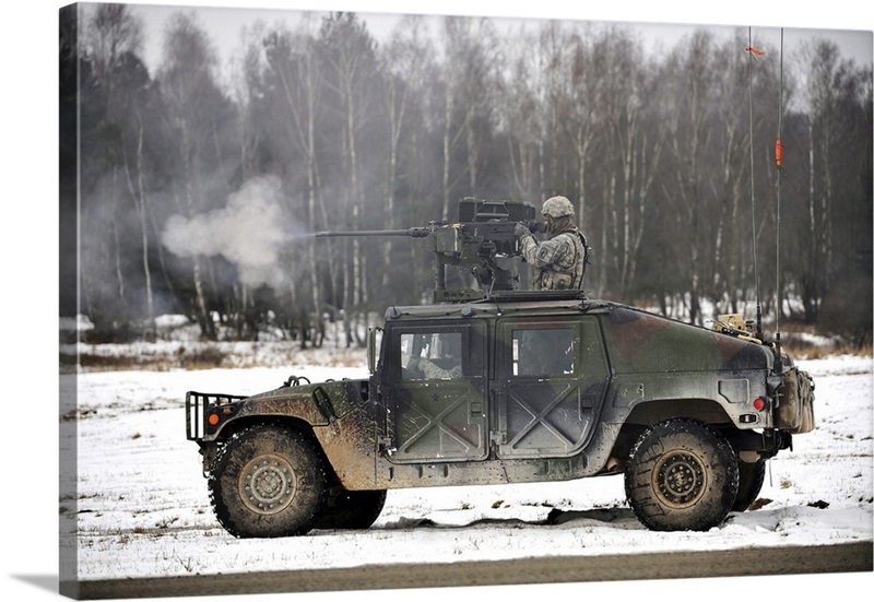 US Army Paratrooper Fires An M2 50-Caliber Machine Gun Atop A Humvee ...