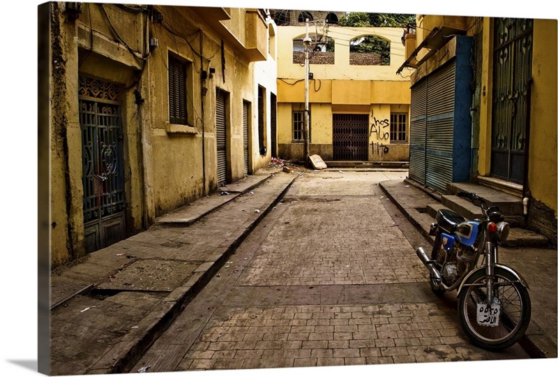 Back street of Luxor Town, Egypt with motorbike | Great Big Canvas
